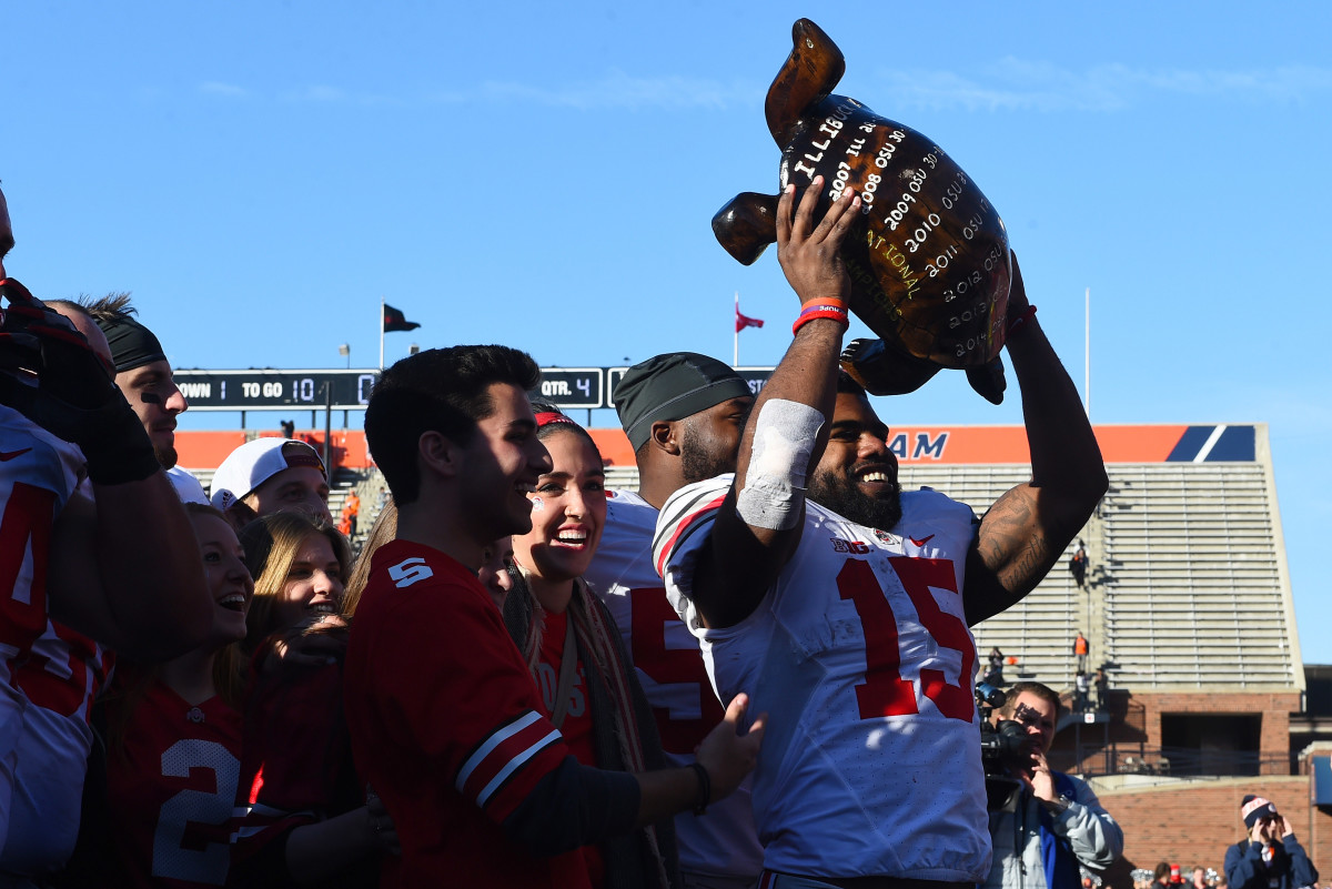 Fascinating College Football Rivalry Trophies Fans Might Not Know ...