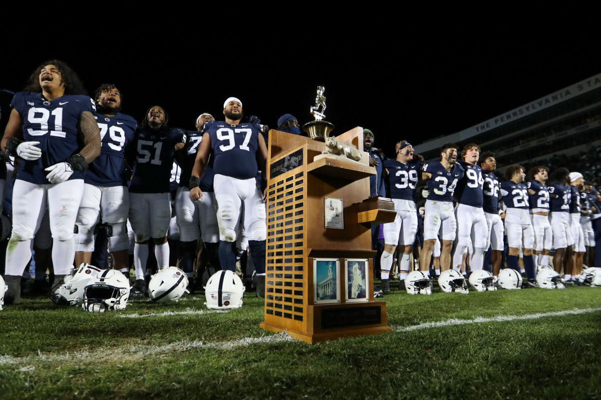 Fascinating College Football Rivalry Trophies Fans Might Not Know ...
