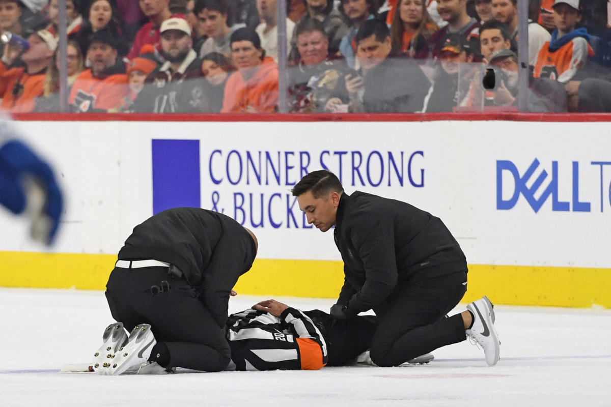 NHL Referee Hospitalized But 'Fully Communicative' After On-Ice ...