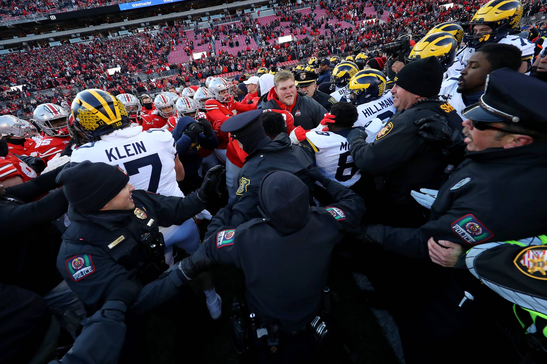 Video Shows Police Officer Knocked to the Ground During Michigan-Ohio ...